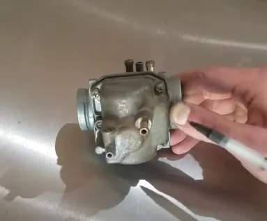 3 Reasons Why Carb Spitting Fuel Into Air Filter : [Visual Guide!]